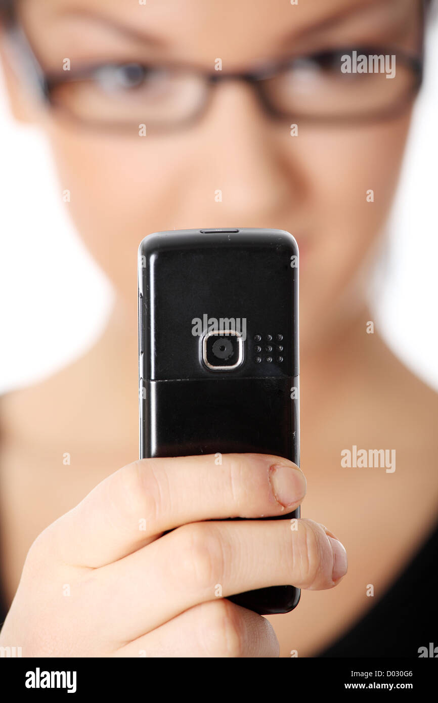 Young woman using cell phone Stock Photo - Alamy