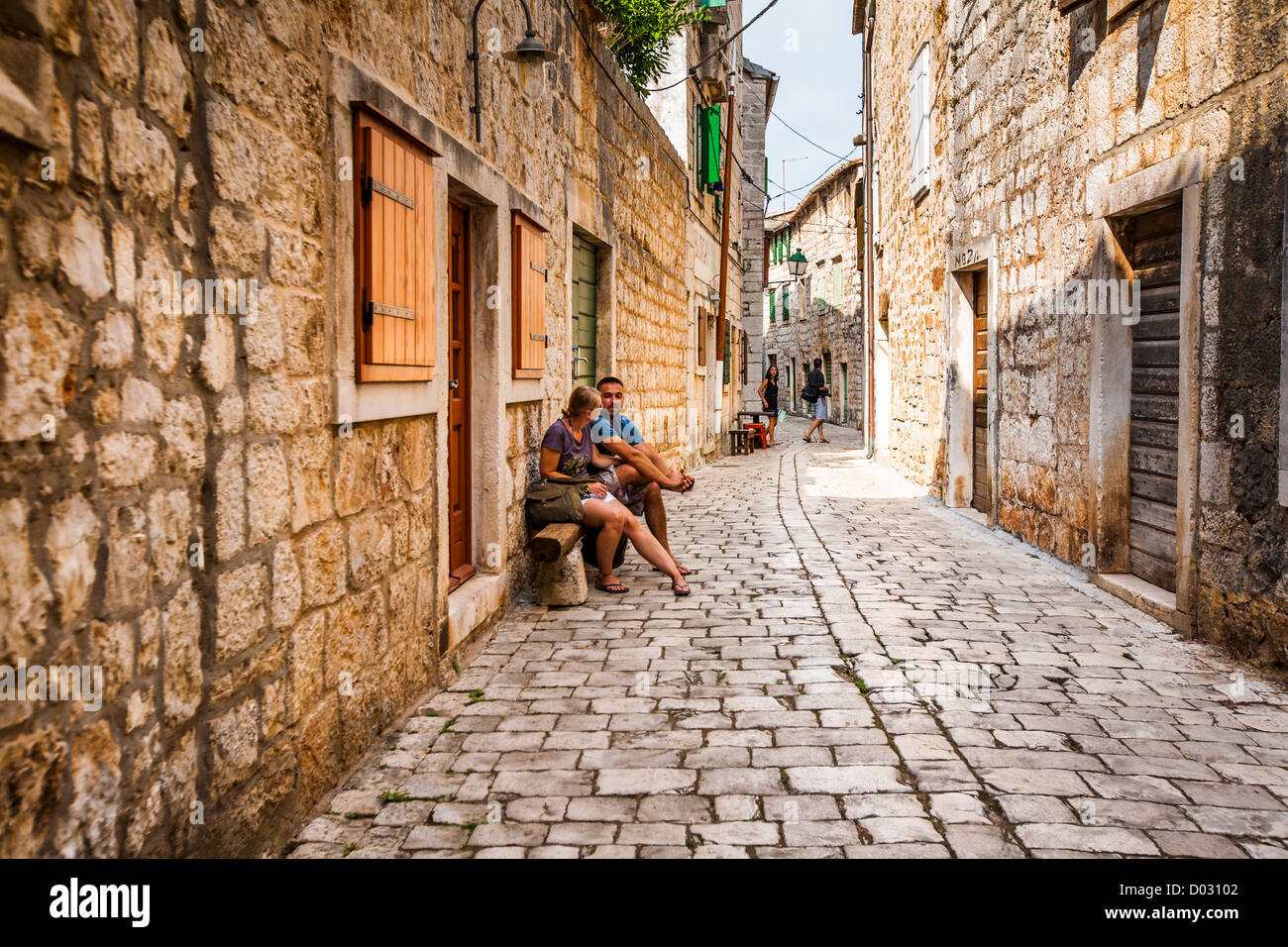 Alley in port town Stari Grad on Hvar island, Croatia Stock Photo - Alamy