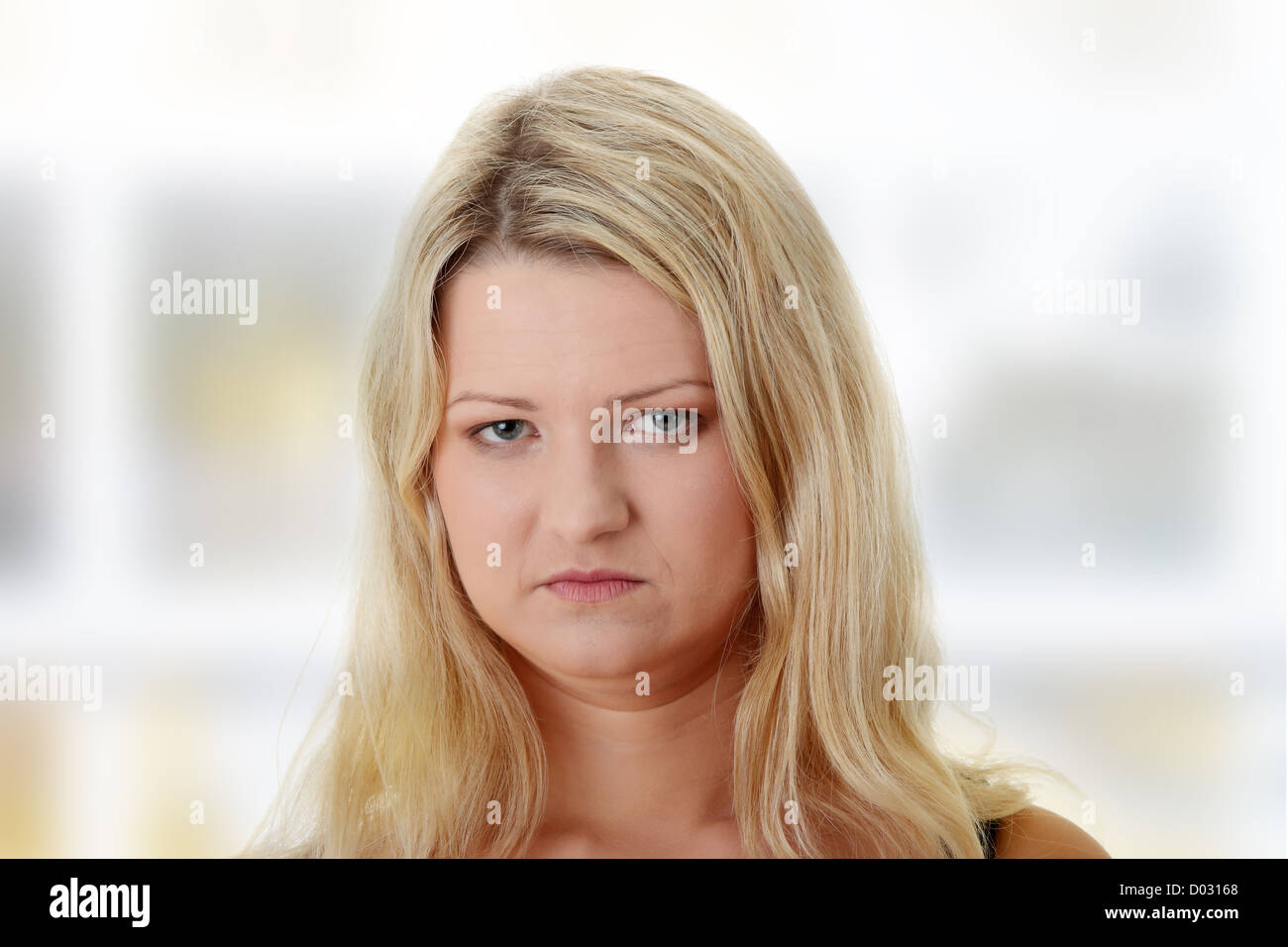 Close-up, portrait of a corpulent woman, isolated on white background ...