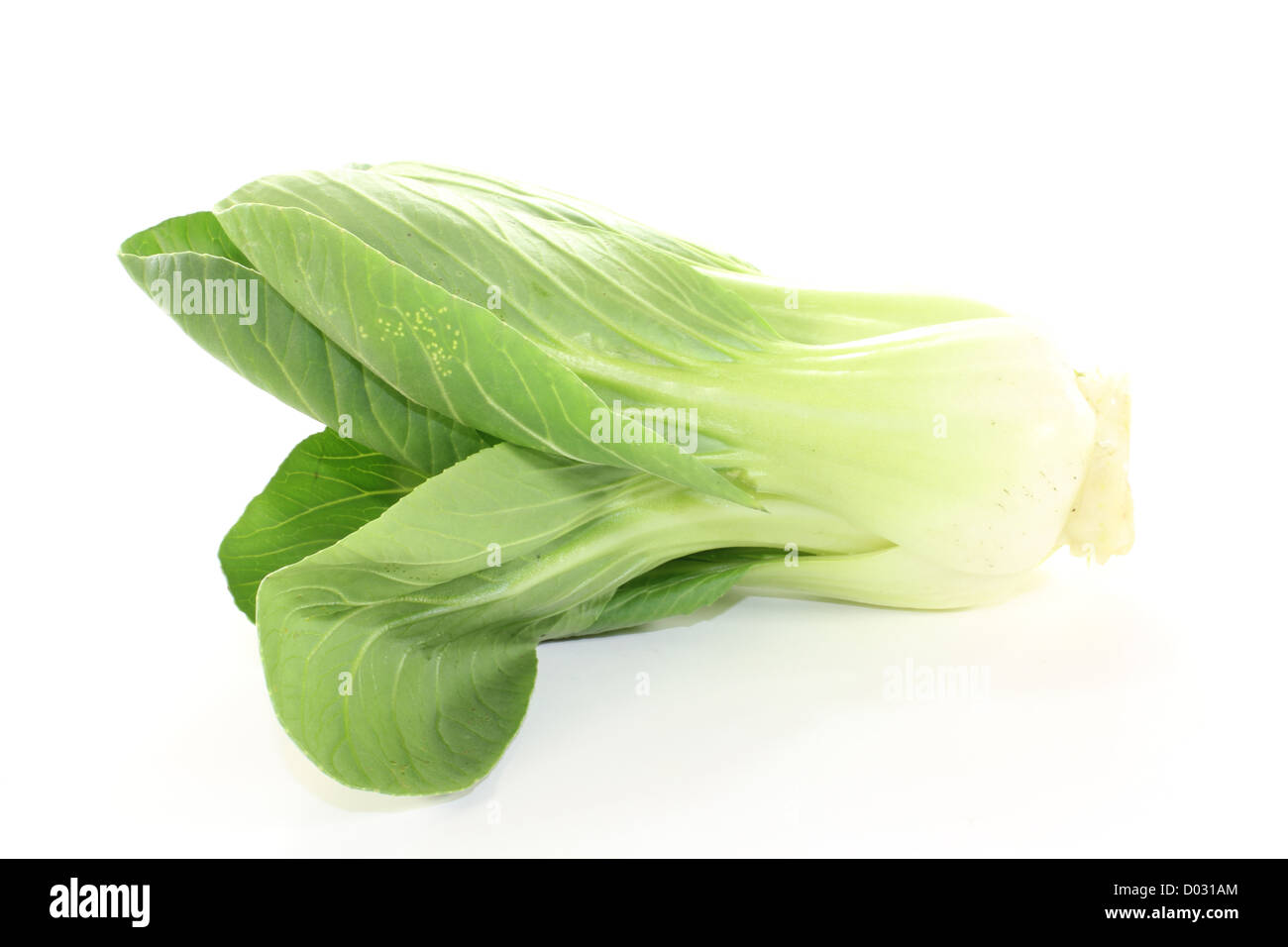 raw crisp white and green pak choi on a light background Stock Photo ...