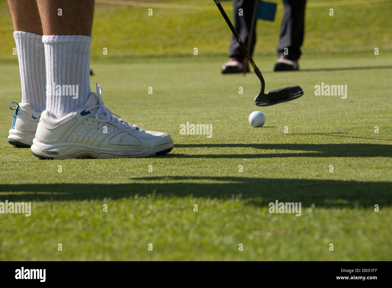 a moment of a golf match Stock Photo - Alamy