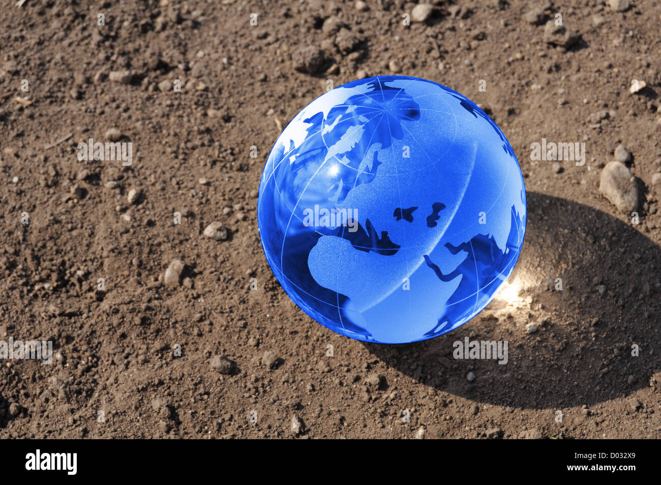 climate change concept with earth planet on dry soil and copyspace ...