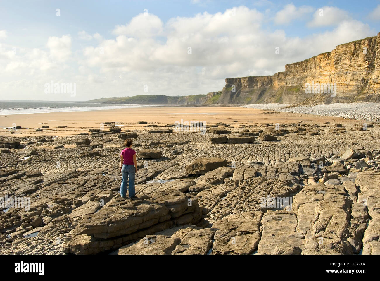 Steep cliff looking down on the beach and ocean hi-res stock ...