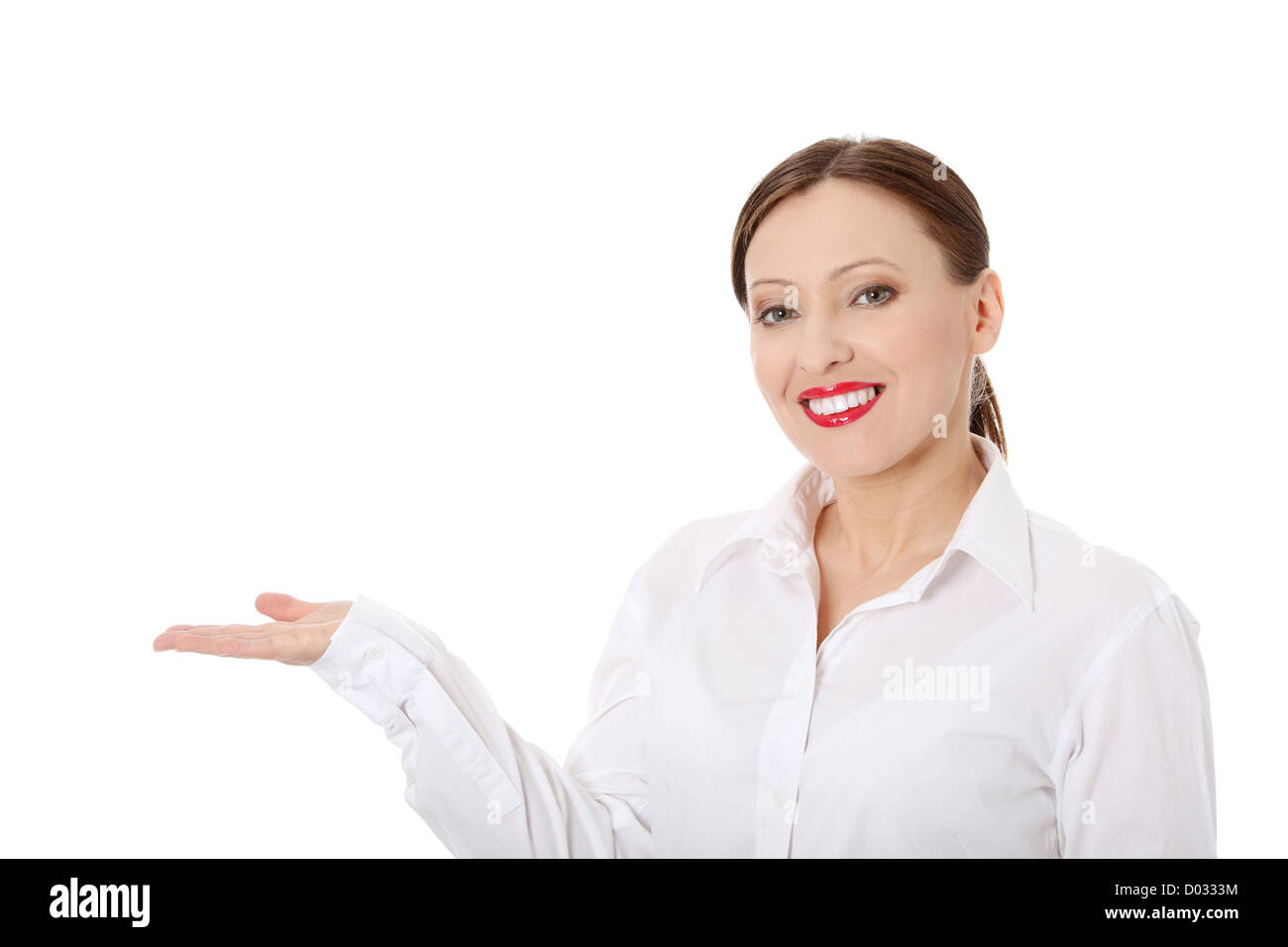 Happy businesswoman presenting something hi-res stock photography and ...