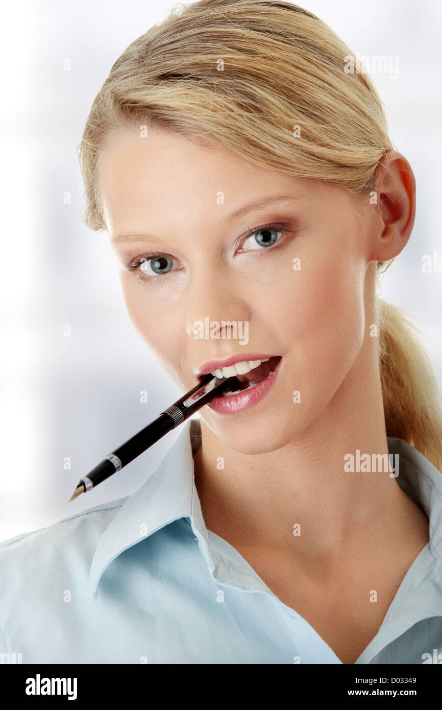 Young beautiful student girl with pen Stock Photo - Alamy