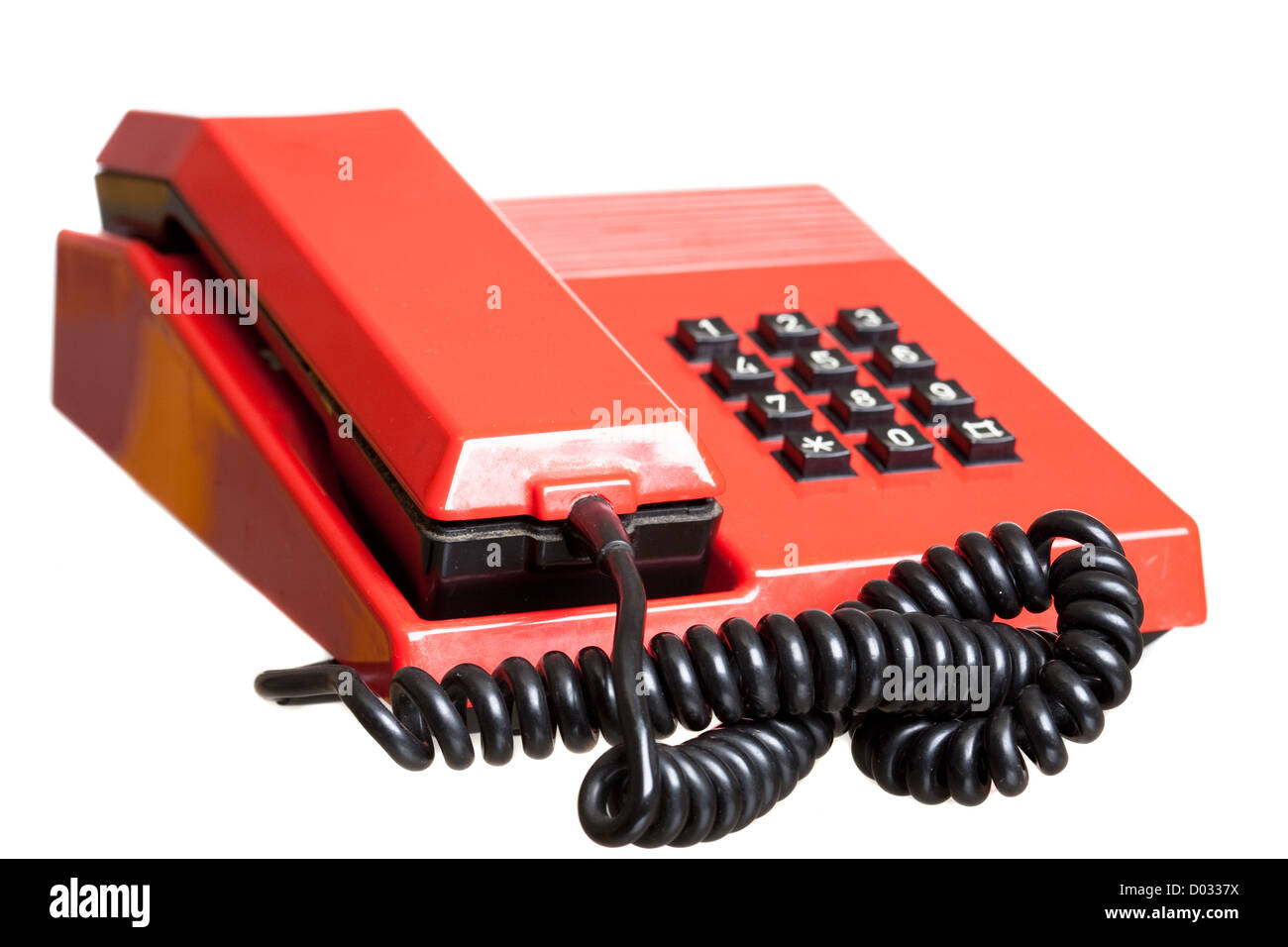 Red telephone isolated on a white background Stock Photo - Alamy