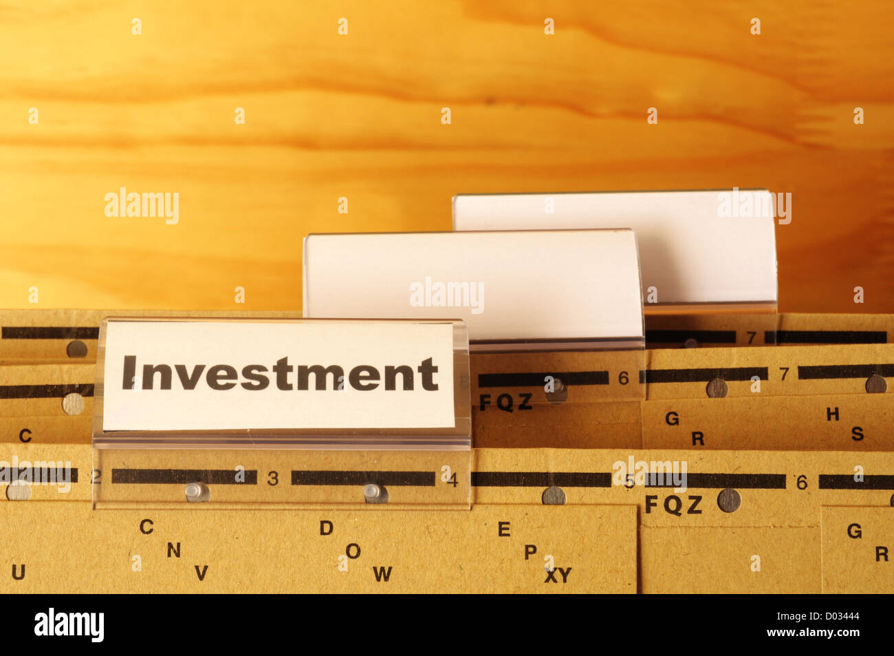 investment word on business folder showing financial success concept ...