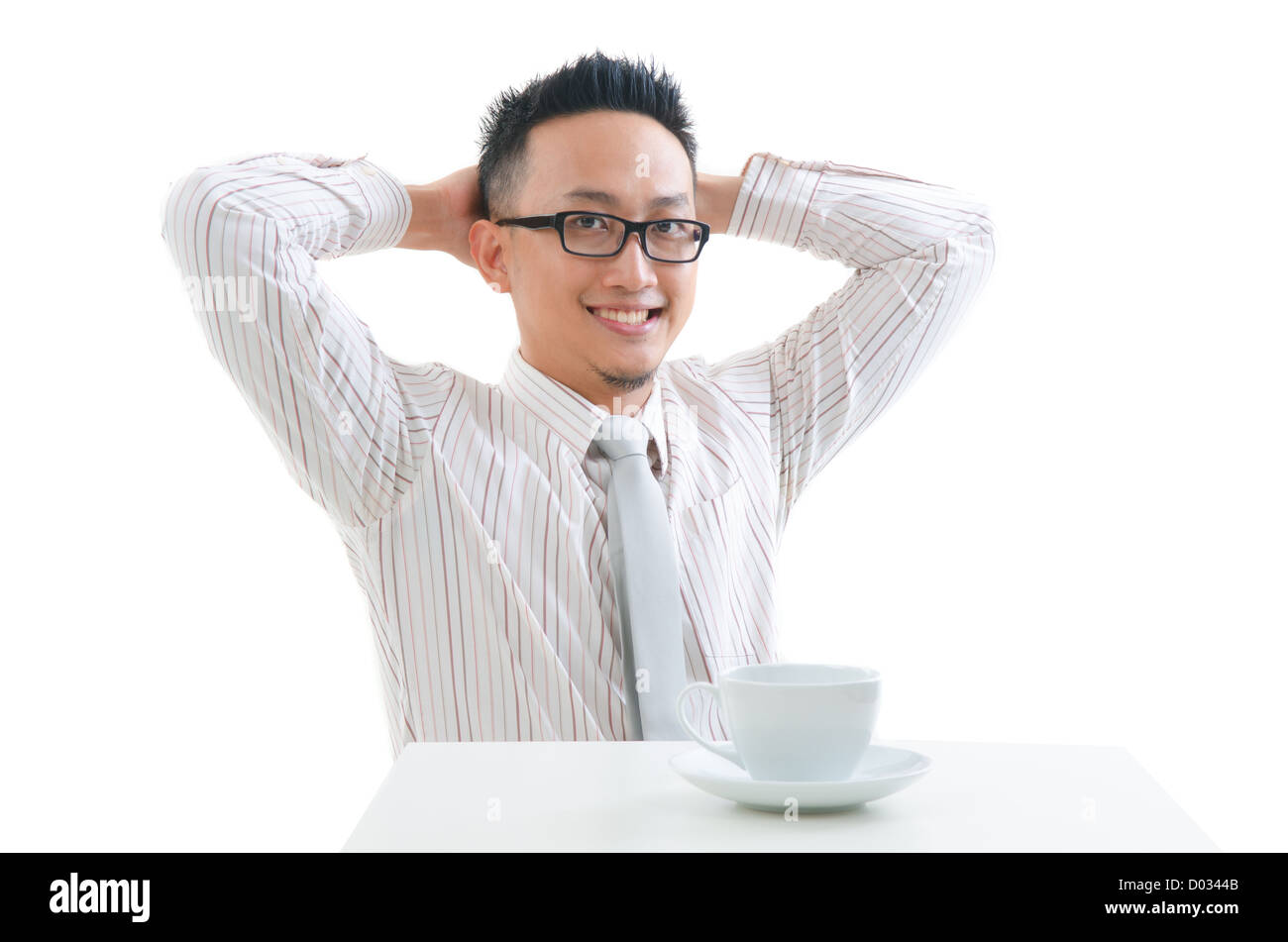 asian man having tea or coffee break Stock Photo - Alamy