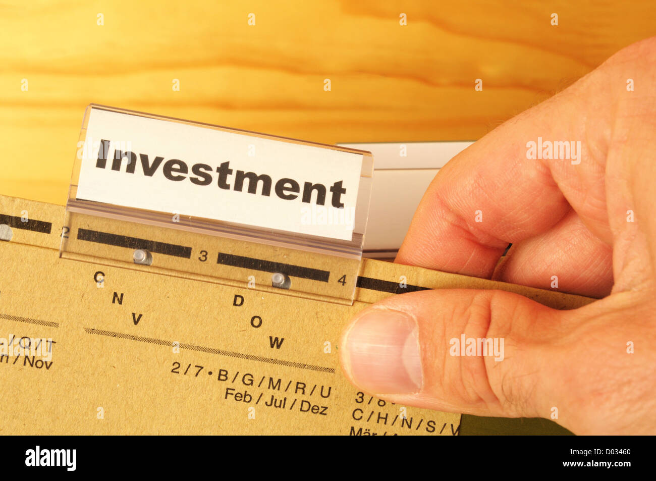 investment word on business folder showing financial success concept ...