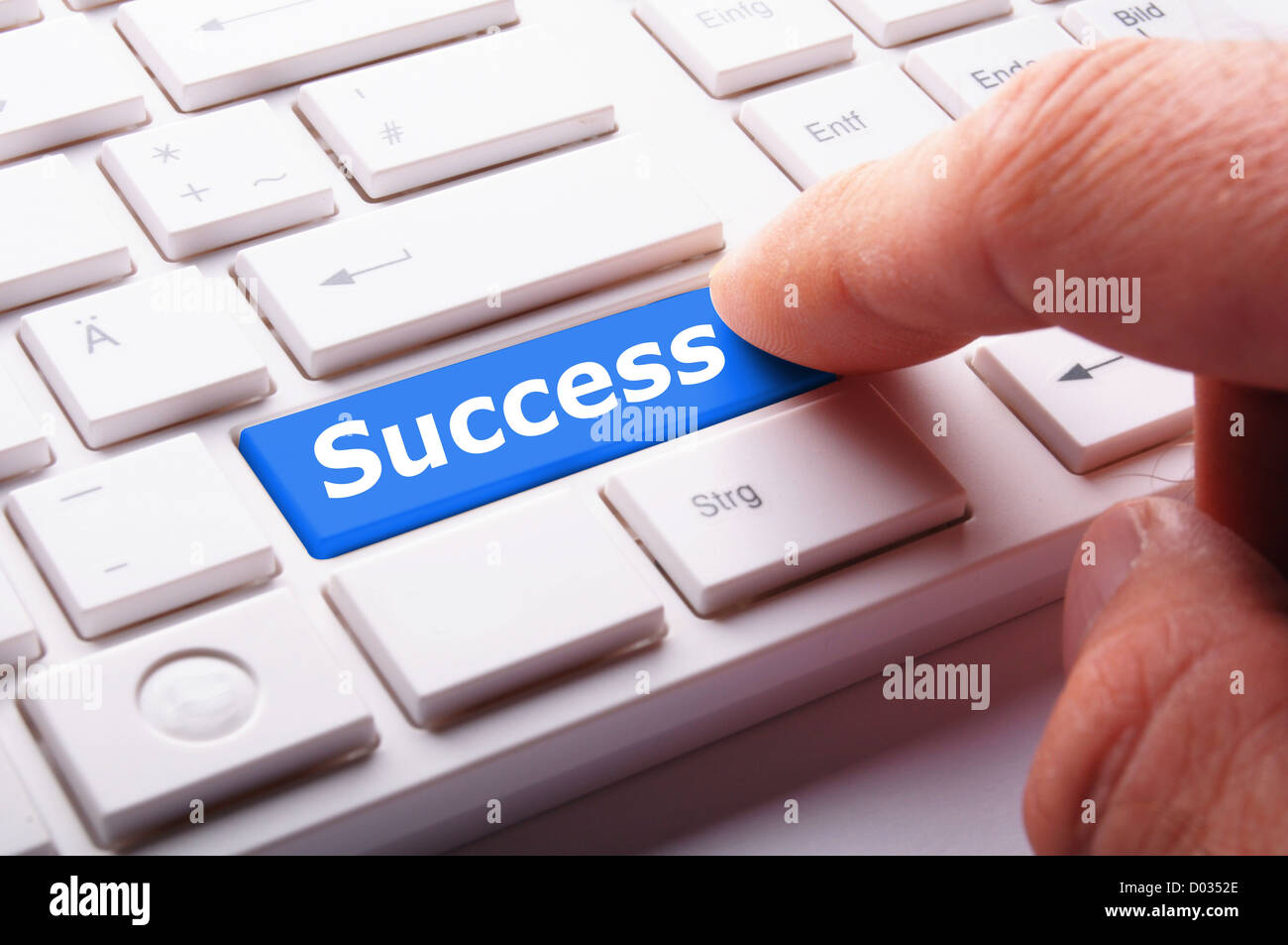 success in business concept with key on computer keyboard Stock Photo ...