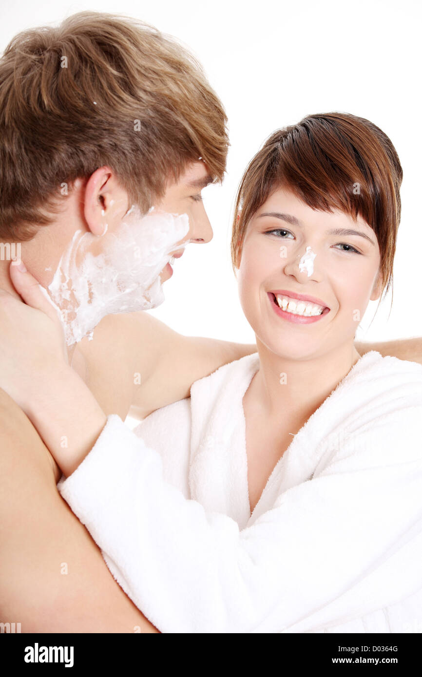 Young couple in bathroom, isolated on white Stock Photo - Alamy