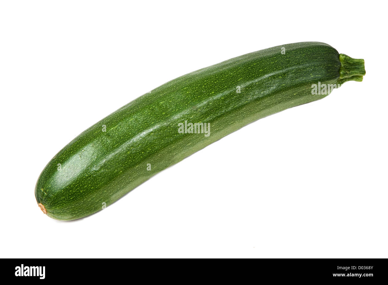 Photo of one zucchini on a over white background Stock Photo - Alamy