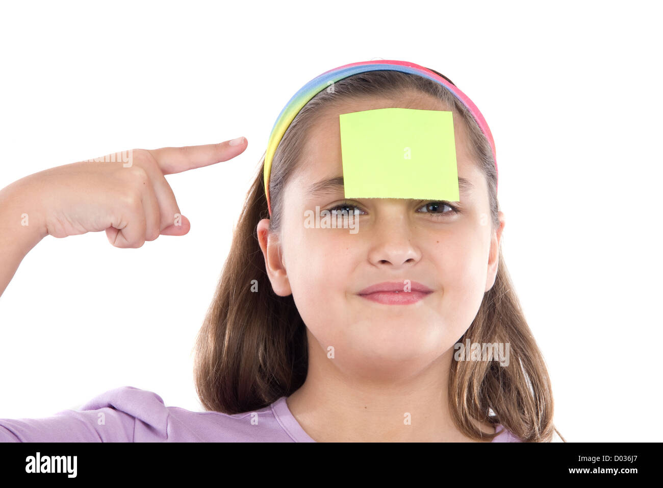 Adorable girl with a note in her front isolated over white Stock Photo ...