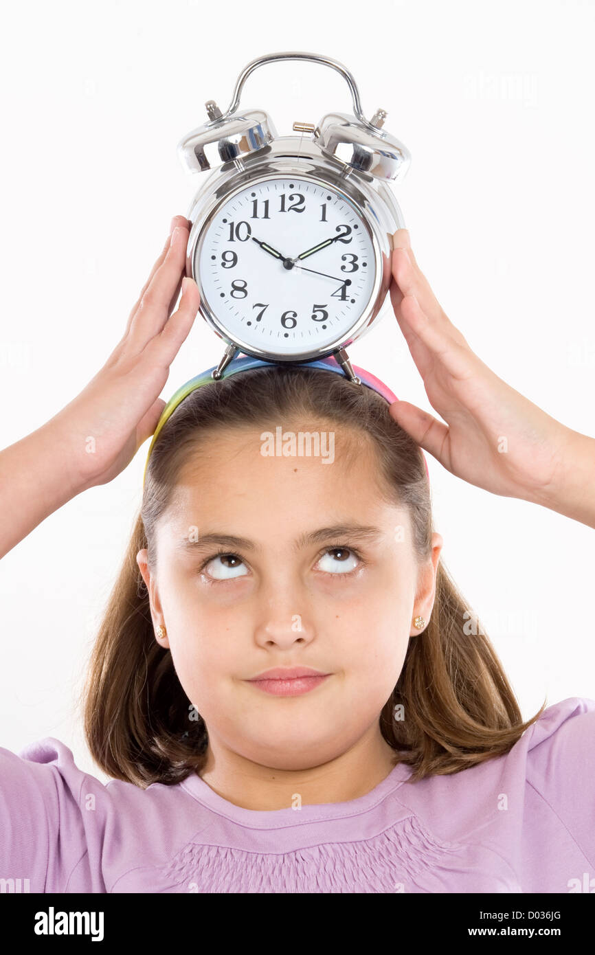Beautiful girl with clock on a over white background Stock Photo - Alamy