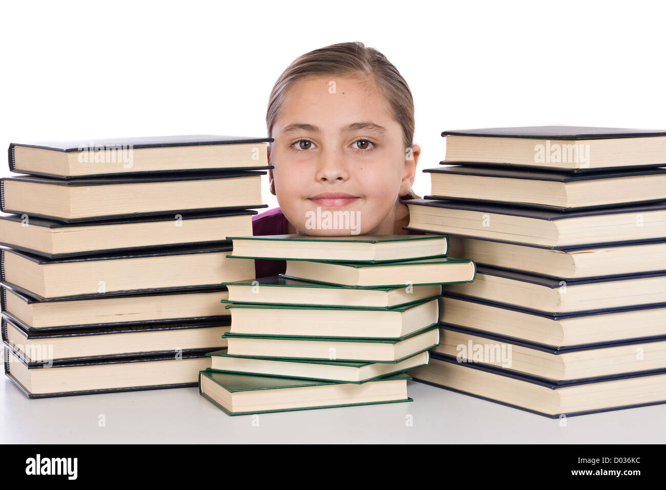 Adorable girl with many books on a over white background Stock Photo ...