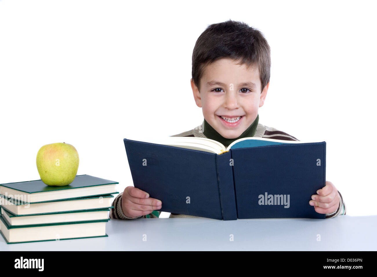 Adorable child studying with books and apple on a over white background ...
