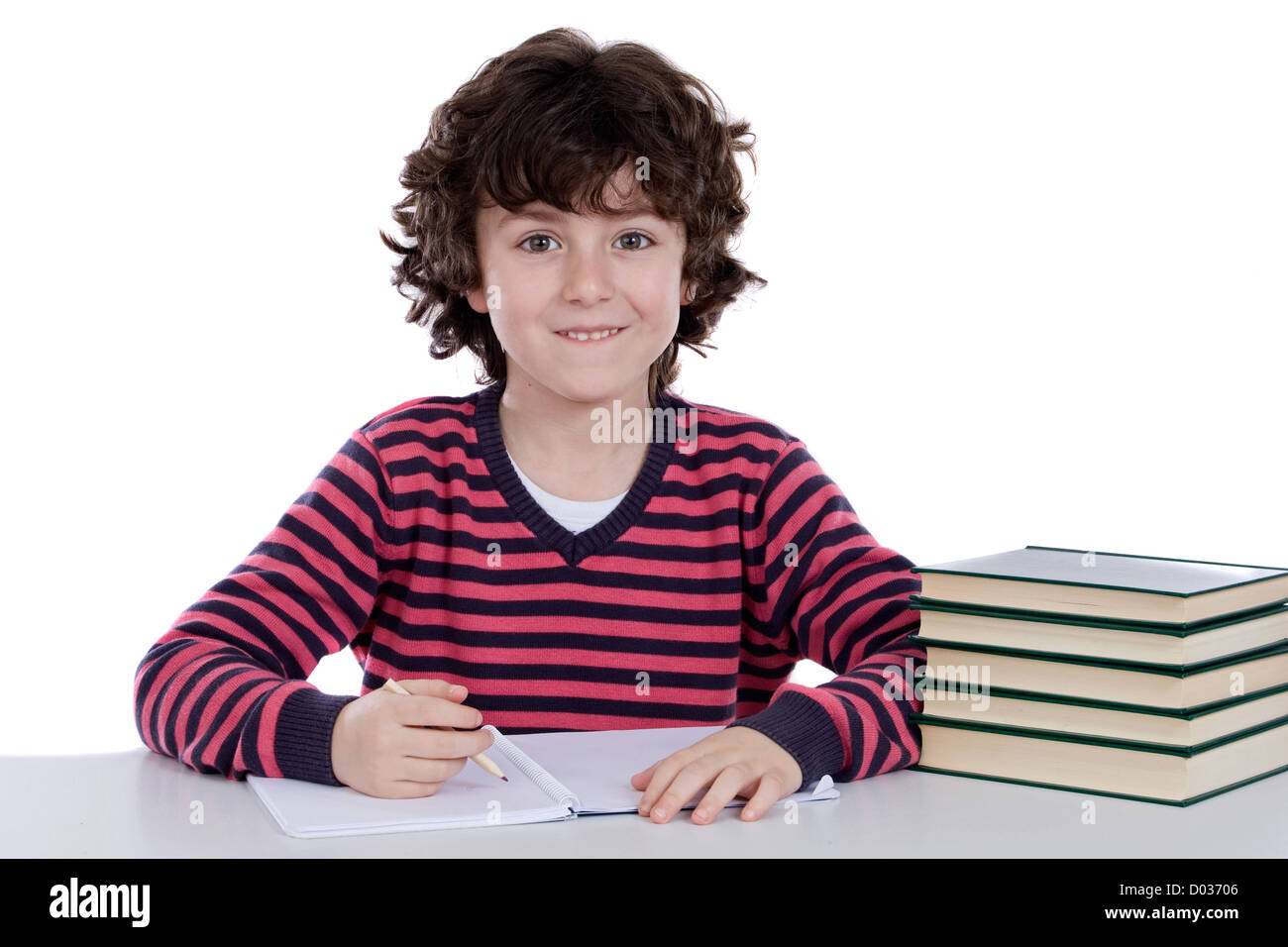 Adorable boy studying a over white background Stock Photo - Alamy