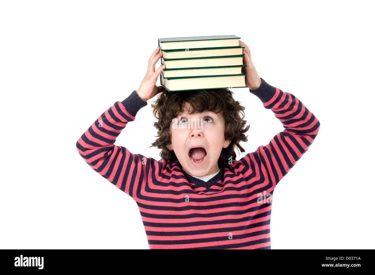 Adorable child with many books on the head isolated over white Stock ...