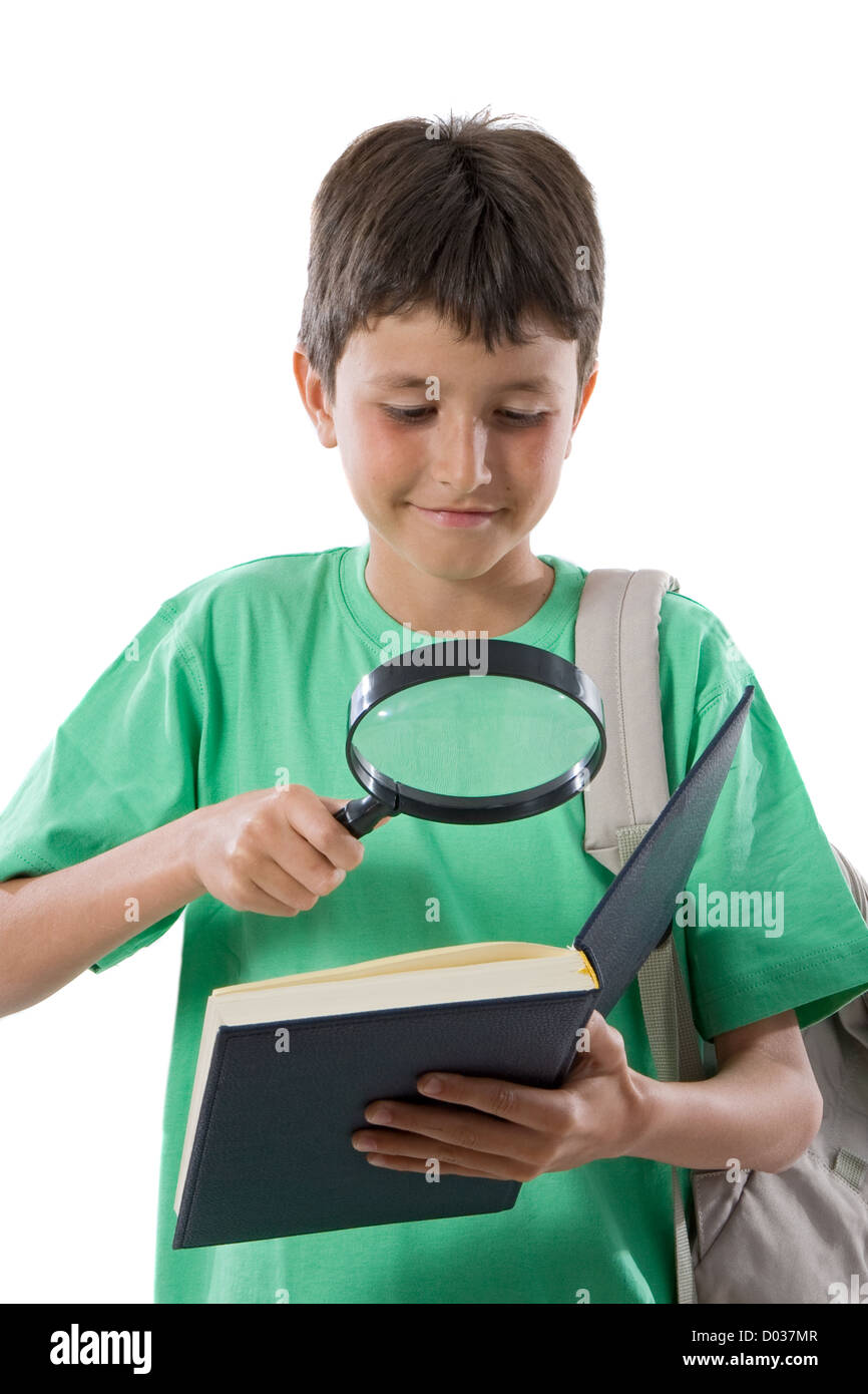 Smiling student reading with a magnifying glass Stock Photo - Alamy