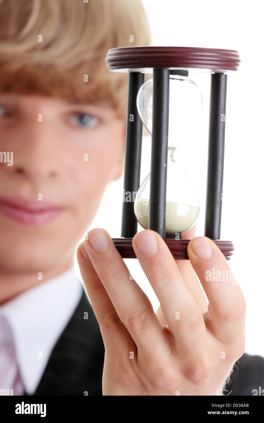 Businessman showing how to save time Stock Photo - Alamy