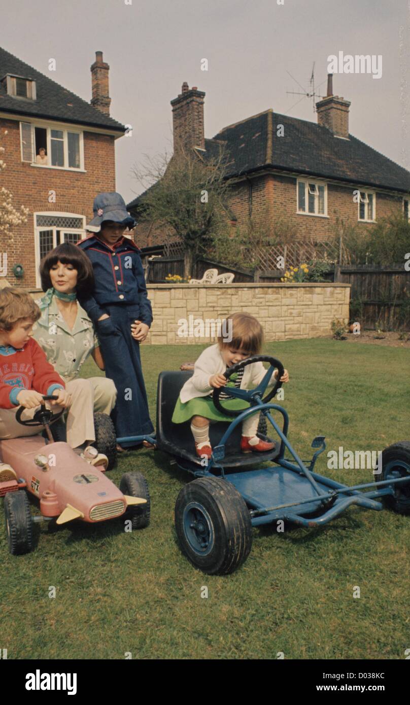 JOAN COLLINS with family 1974 m3323a.Supplied by Photos, inc.(Credit ...