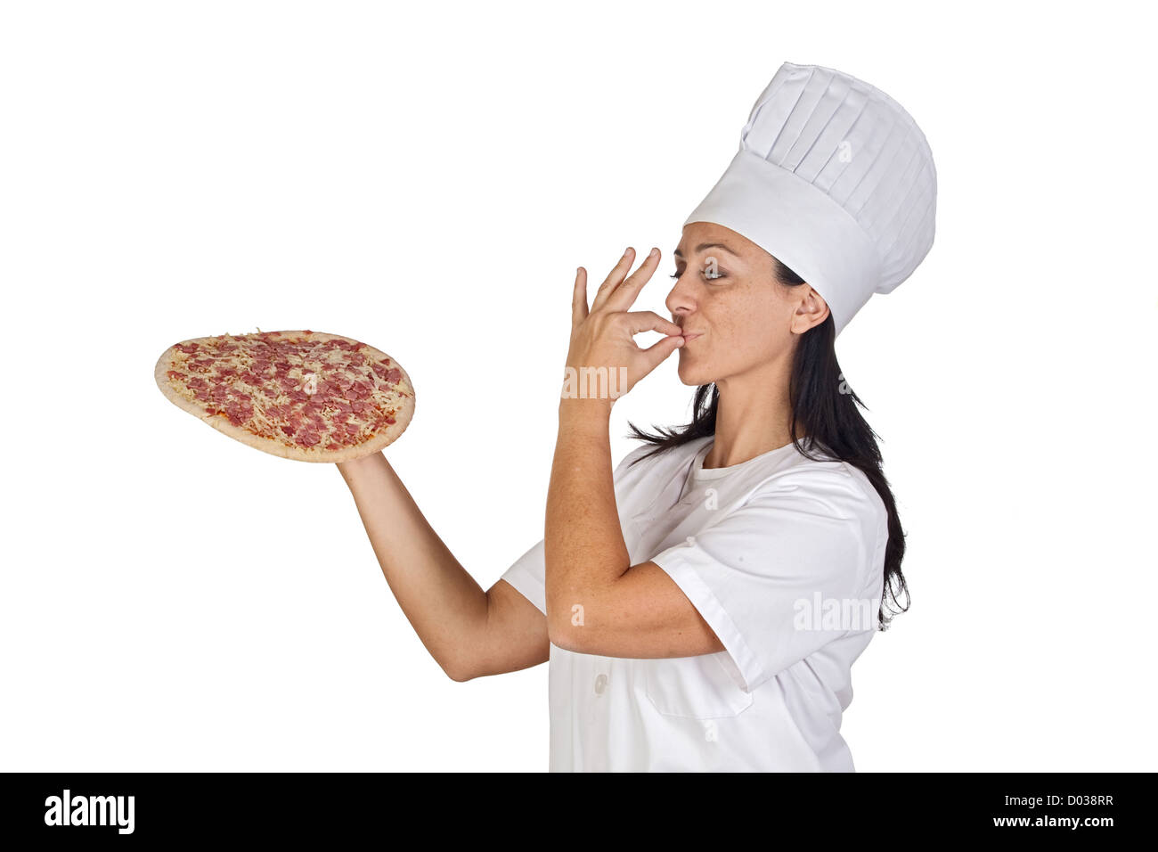 Pretty cook girl with a delicious pizza isolated on white background ...