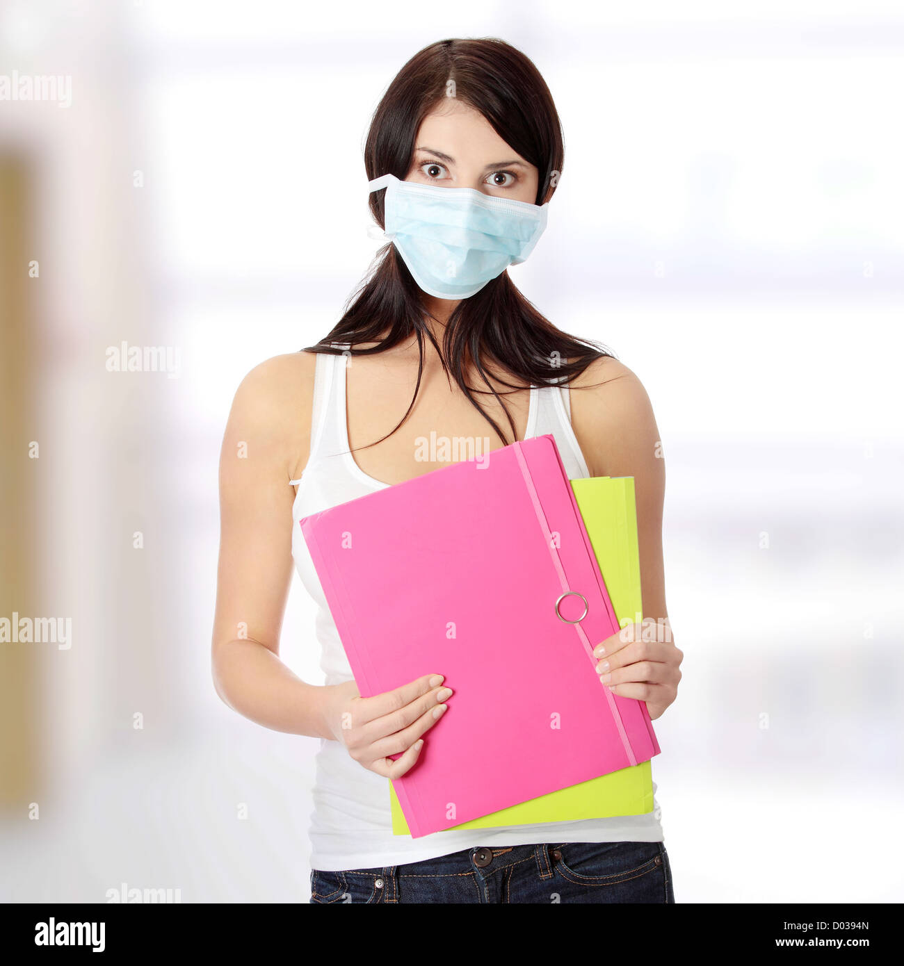 Caucasian student woman with mask on her face. She is defending her ...