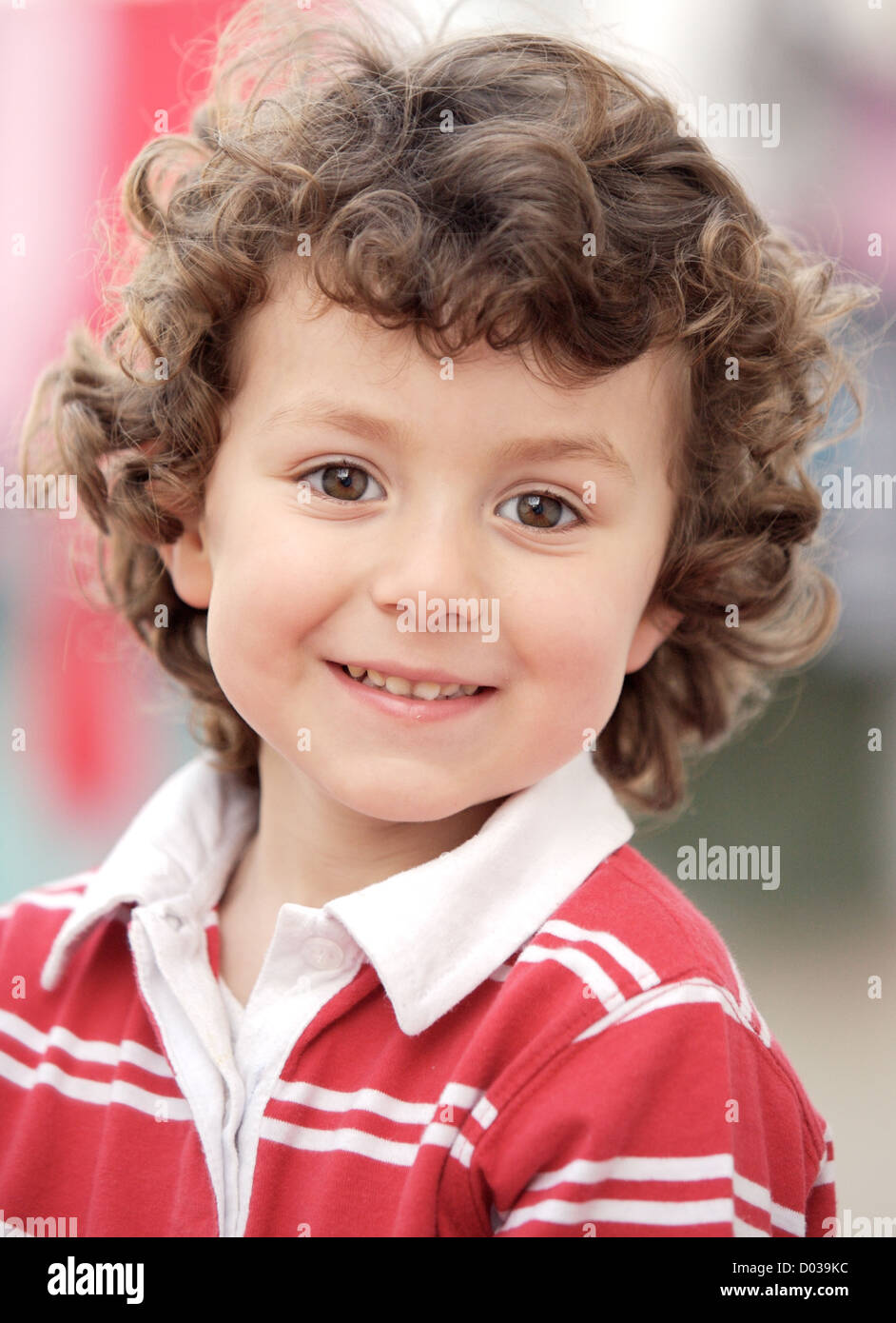 photo of an adorable happy boy smiling Stock Photo - Alamy
