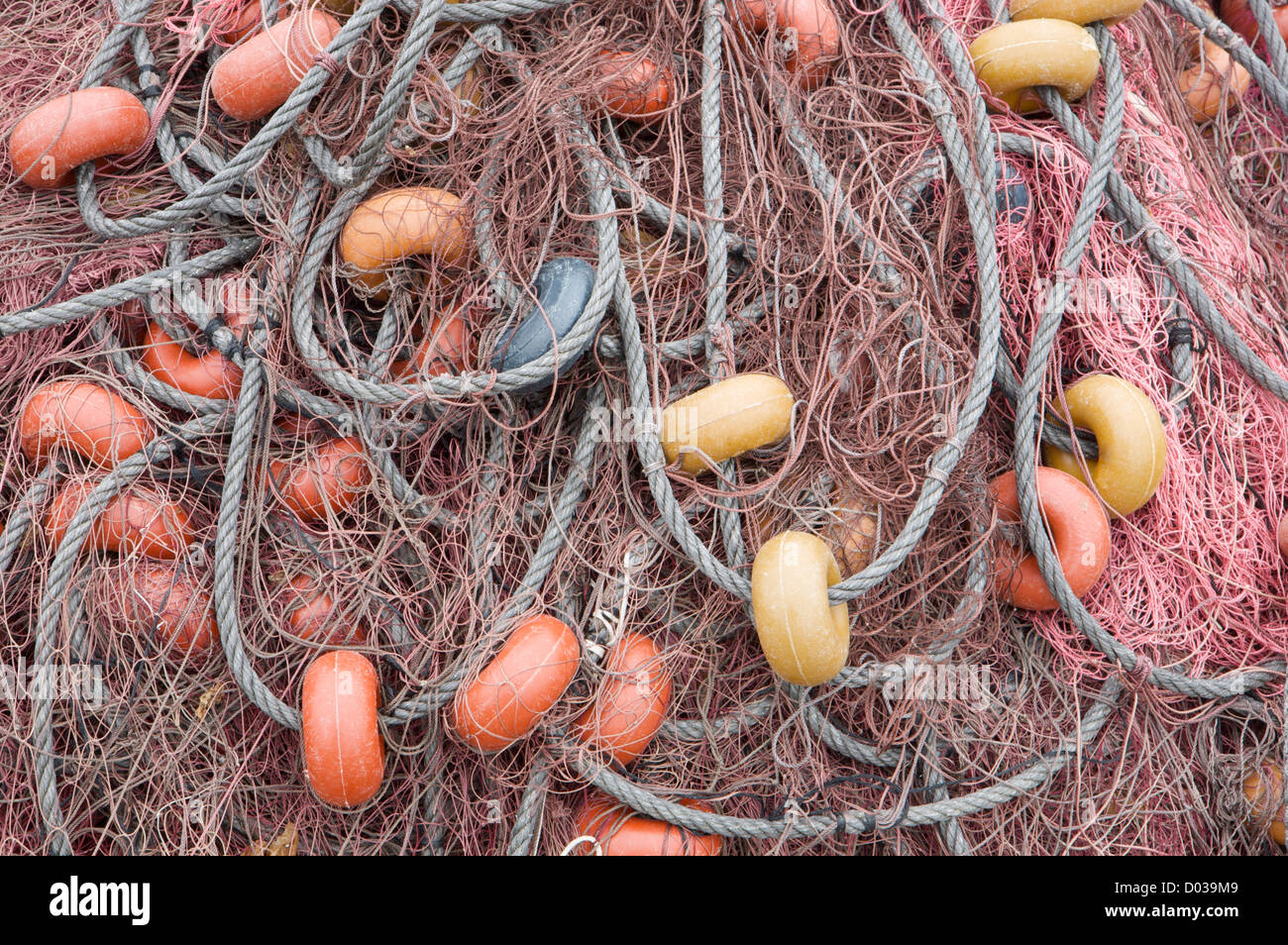 Detail of an old traditional fishing net Stock Photo - Alamy