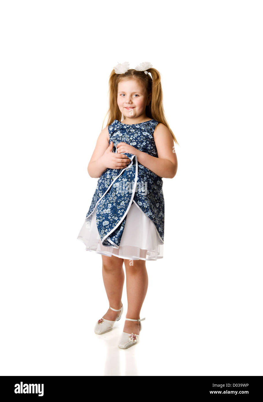 Happy Little girl standing isolated on white Stock Photo - Alamy