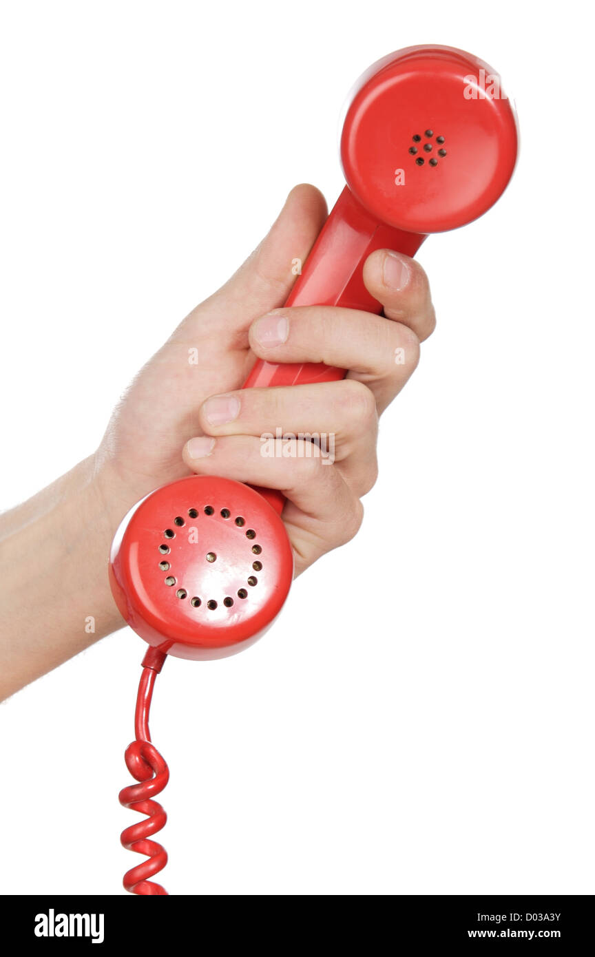 hand holding red telephone a over white background Stock Photo - Alamy