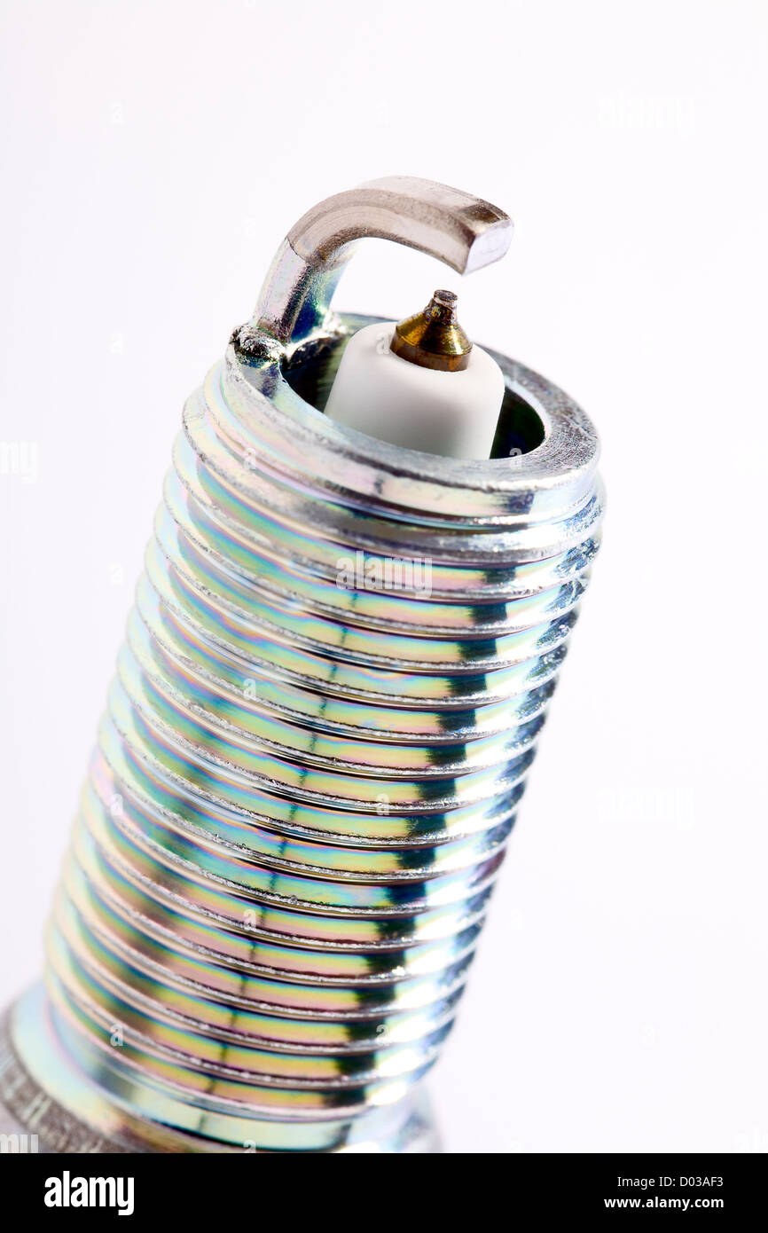 Close up of a spark plug isolated on white background Stock Photo - Alamy