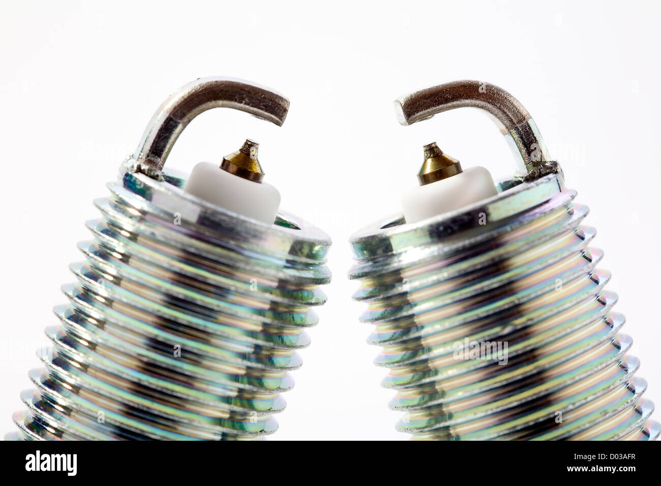 Close up of a spark plugs isolated on white background Stock Photo - Alamy