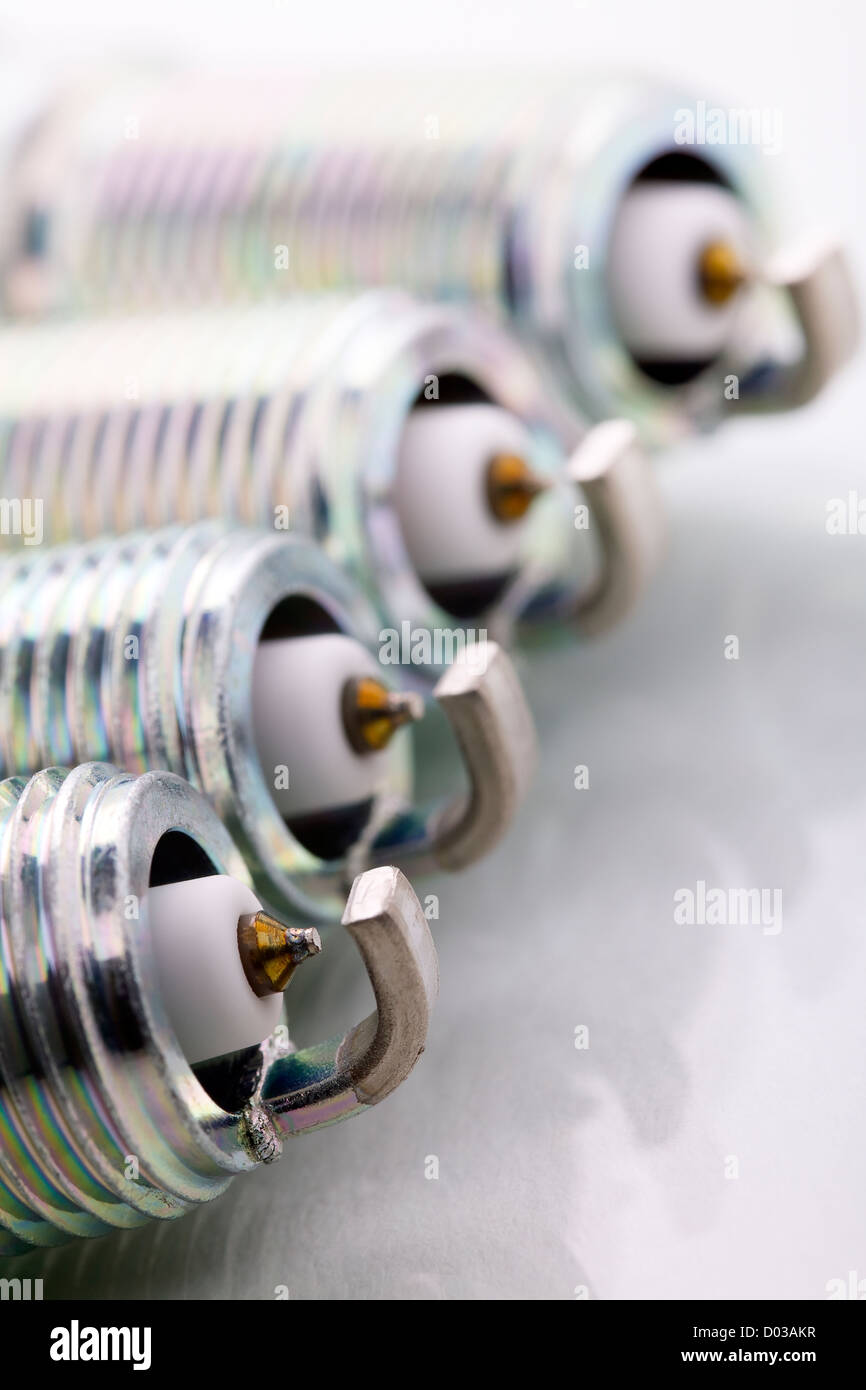 Close up of a spark plug isolated on white background Stock Photo - Alamy