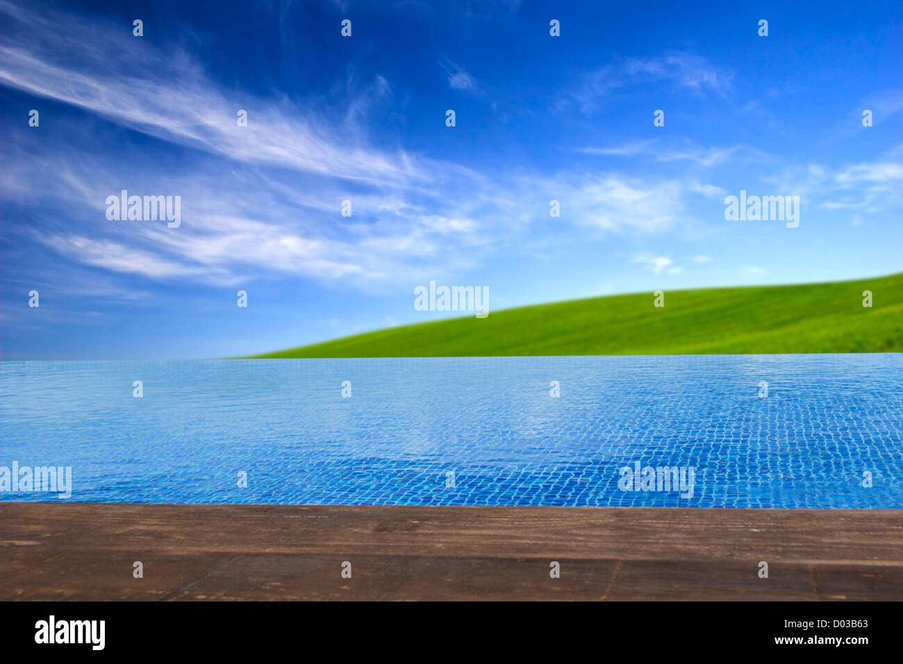 Swimming Pool with clean blue water on a beautiful background landscape ...