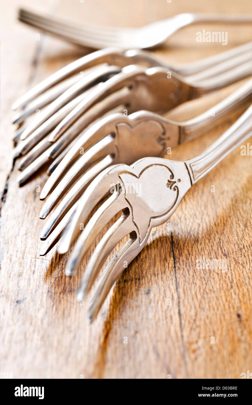 Antique forks at close up - very shallow depth of field Stock Photo - Alamy