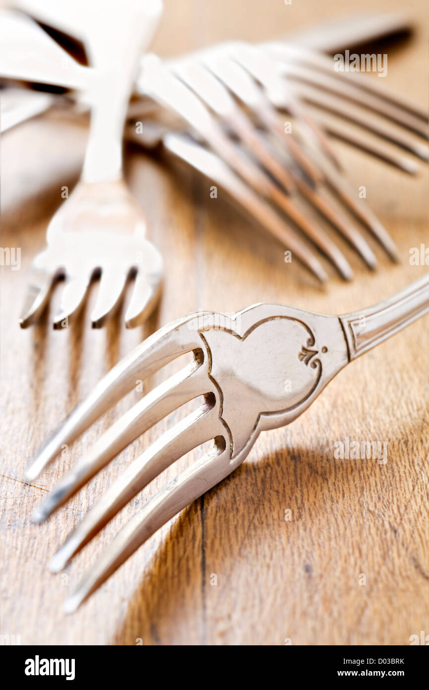 Antique forks at close up - very shallow depth of field Stock Photo - Alamy