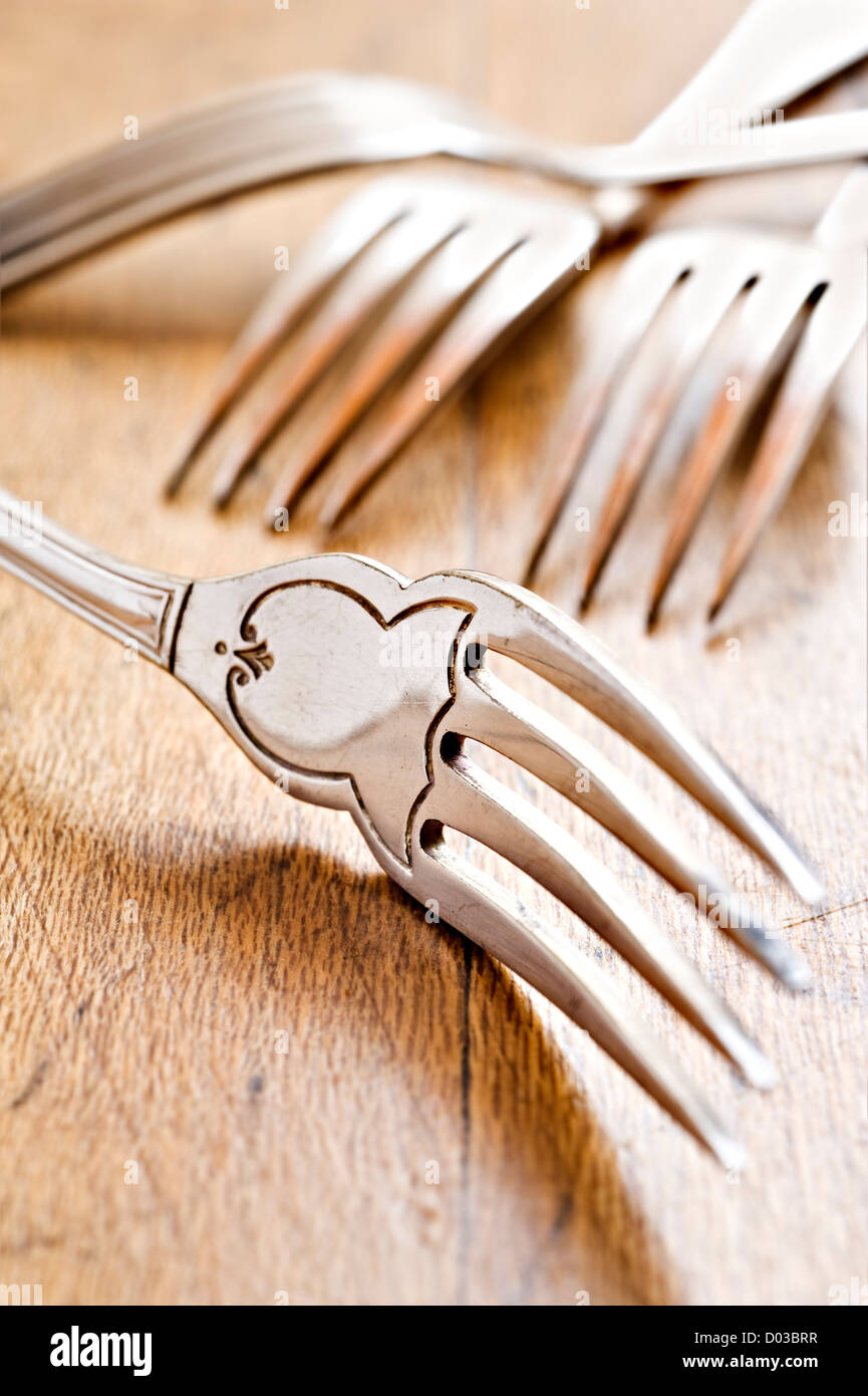 Antique forks at close up - very shallow depth of field Stock Photo - Alamy
