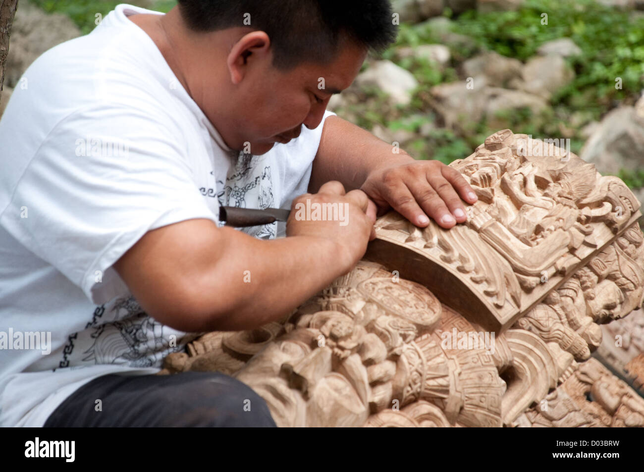 Mexican wood carver artist at Chichen Itza Yucatan Stock Photo - Alamy