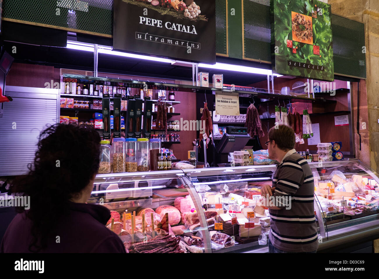 A stall selling cheeses in the Municipal Market Hall in the Old Town of ...