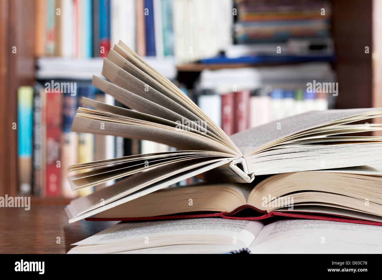 Open book with library in background.Use for education concept Stock ...