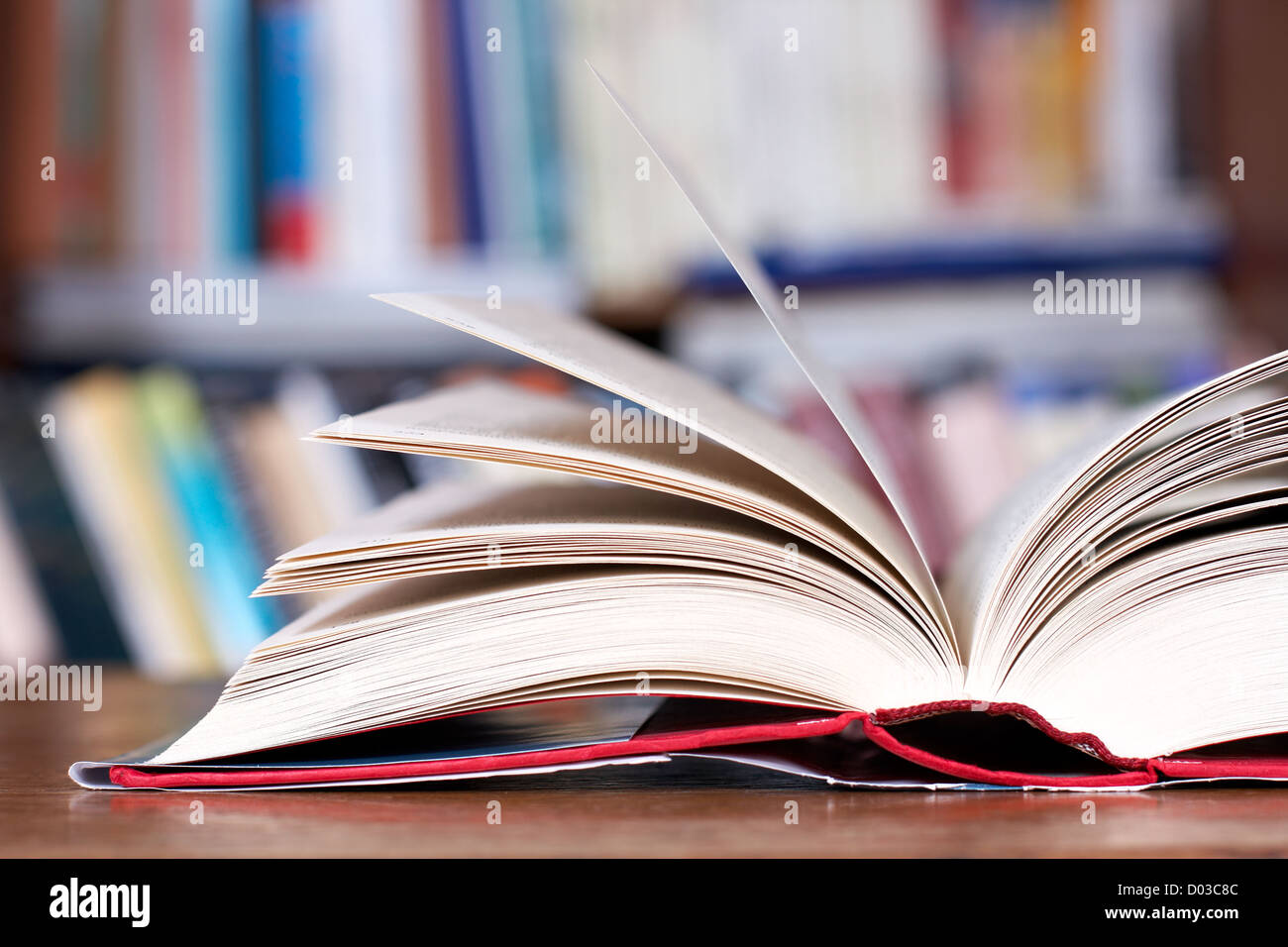 Open book with library in background.Use for education concept Stock ...