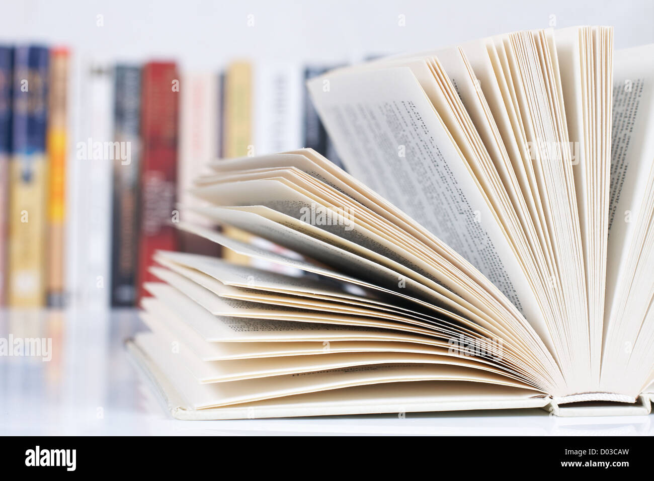 Open book with library in background.Use for education concept Stock ...