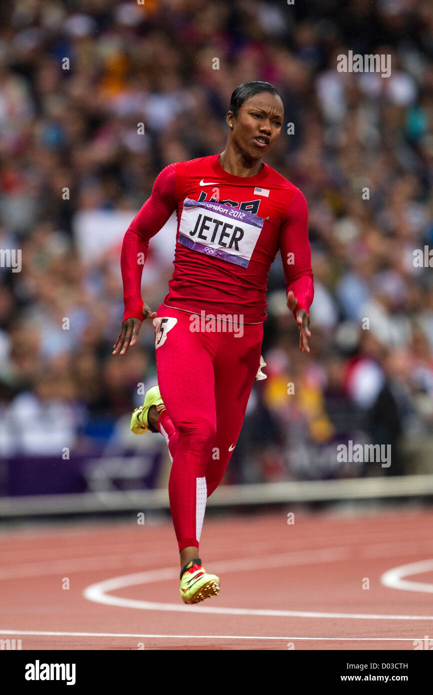 Carmelita Jeter (USA) competing in round 1 of the Women's 200 meters at ...
