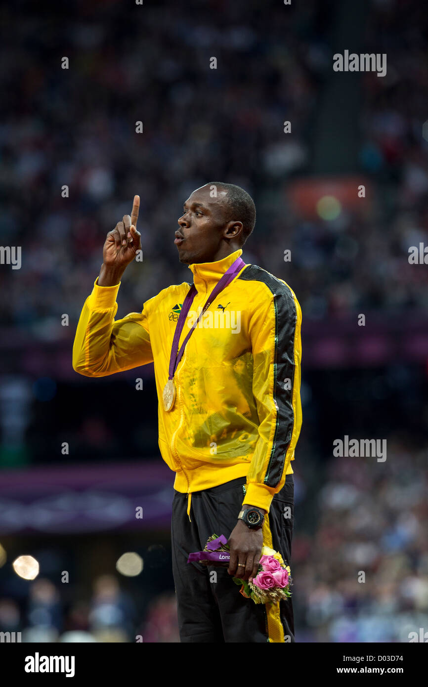 Usain Bolt (JAM) with his gold medal for winning the Men's 100m at t he ...