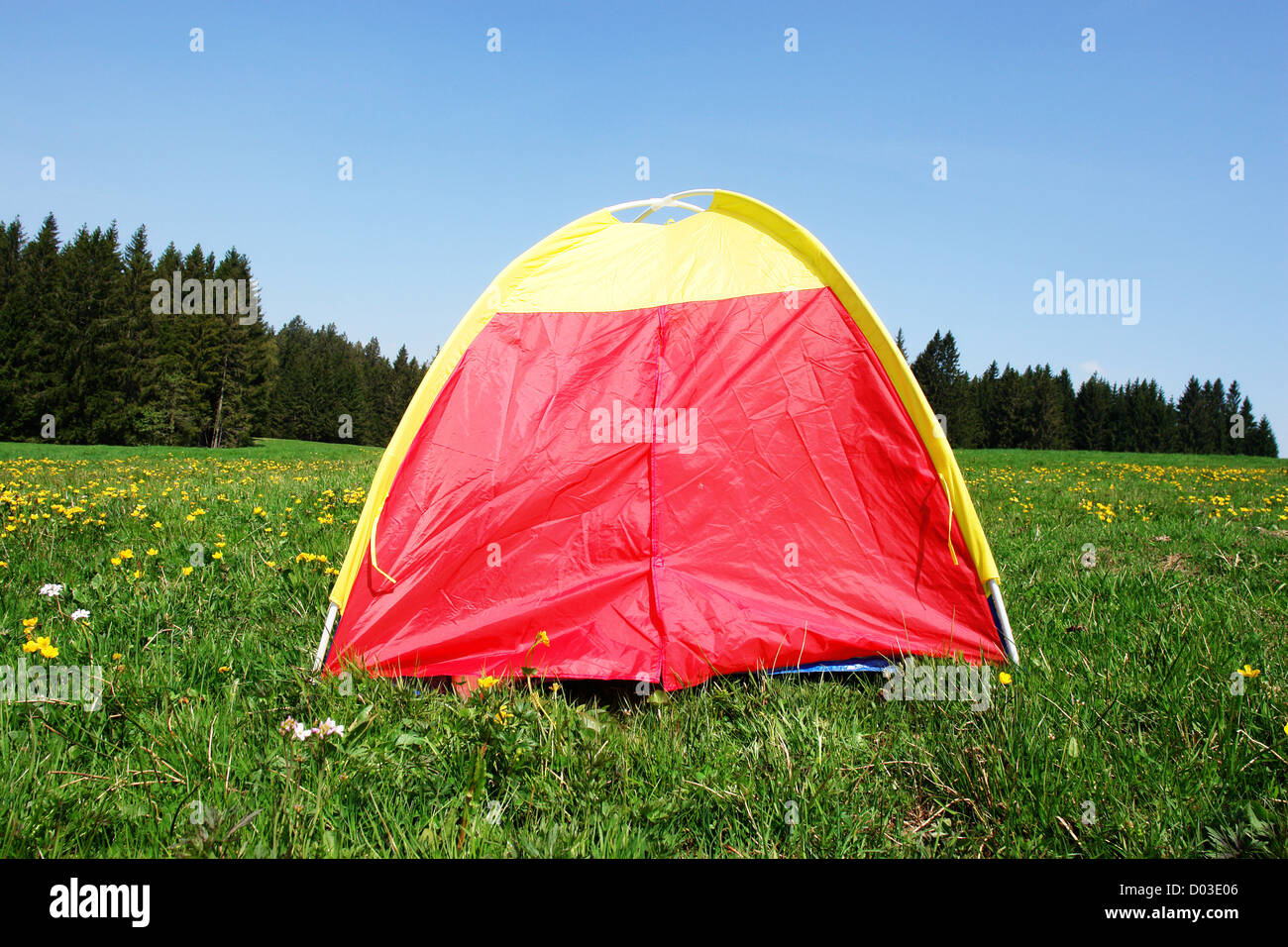 A colourful tent in the meadow outside Stock Photo - Alamy