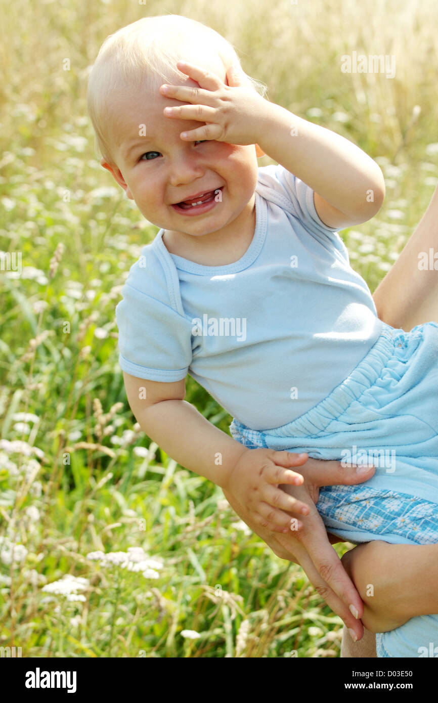 Adorable baby boy outdoors at sunny summer day Stock Photo - Alamy