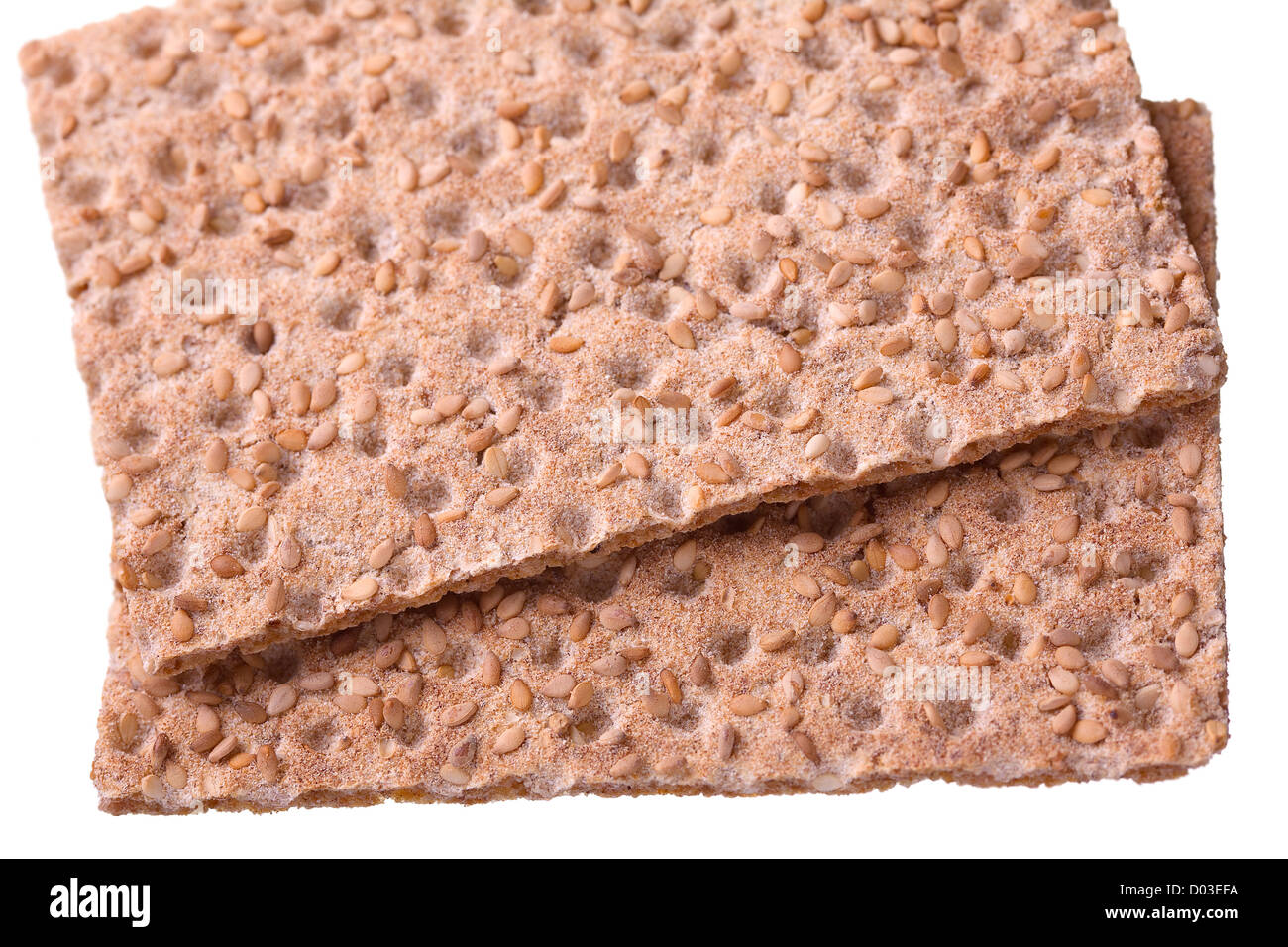 Close up of a crispbread with sesame seeds isolated on white, selective ...
