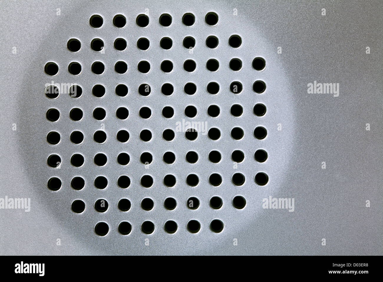Close up of a speaker hole as a interesting background Stock Photo - Alamy