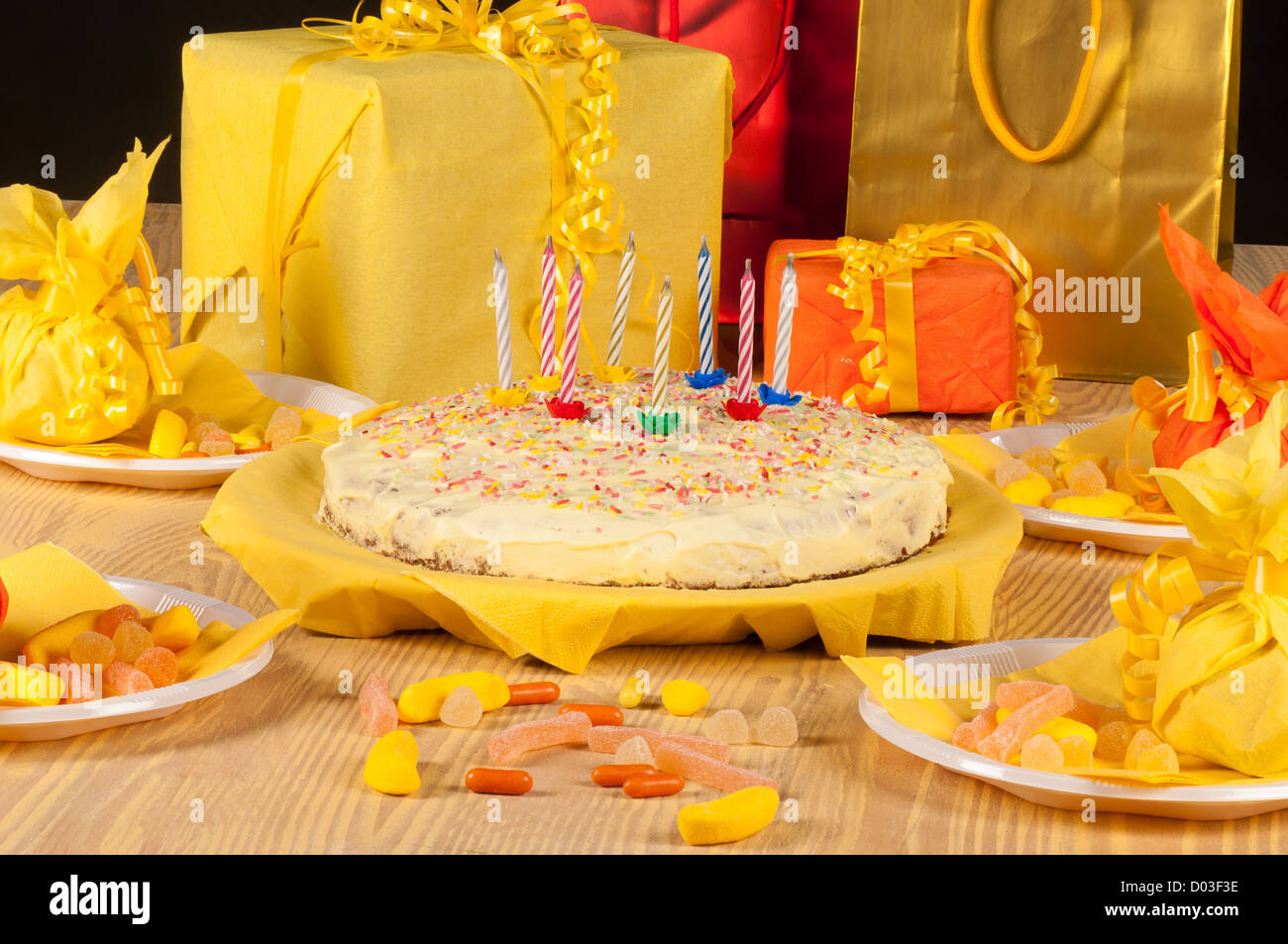 Sweets and gifts on a festive table Stock Photo - Alamy